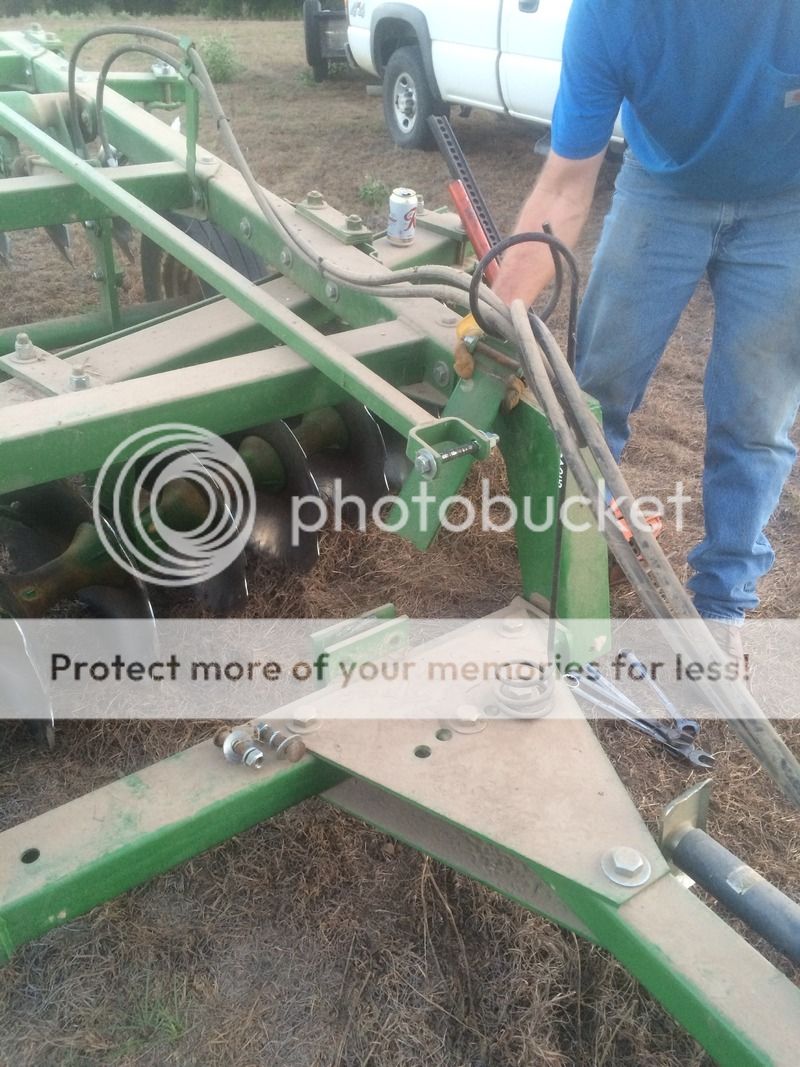 Disk leveling bar spring breakage. Suggestions wanted. - TractorByNet